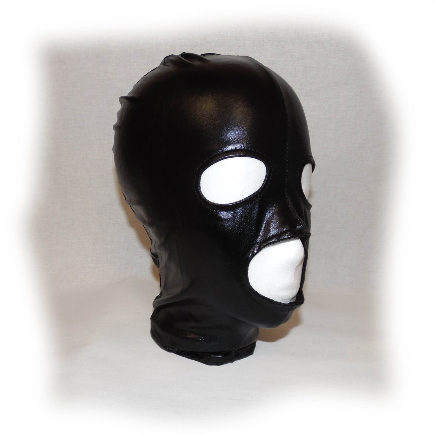 Black mask with open nose, mouth and eyes