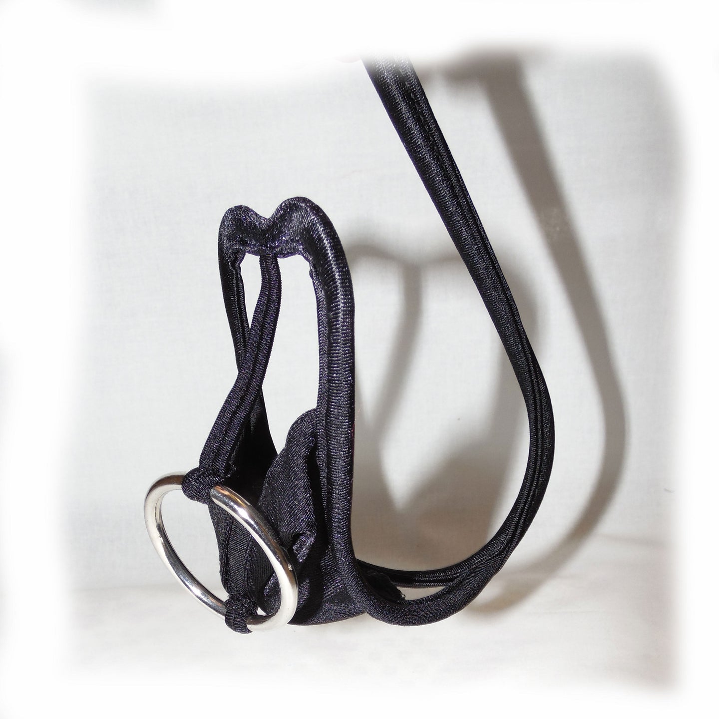 Men's black C-string with ring